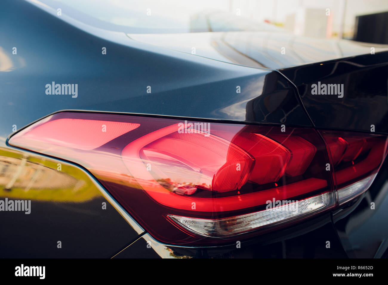 back light with brilliant reflections auto body Stock Photo - Alamy