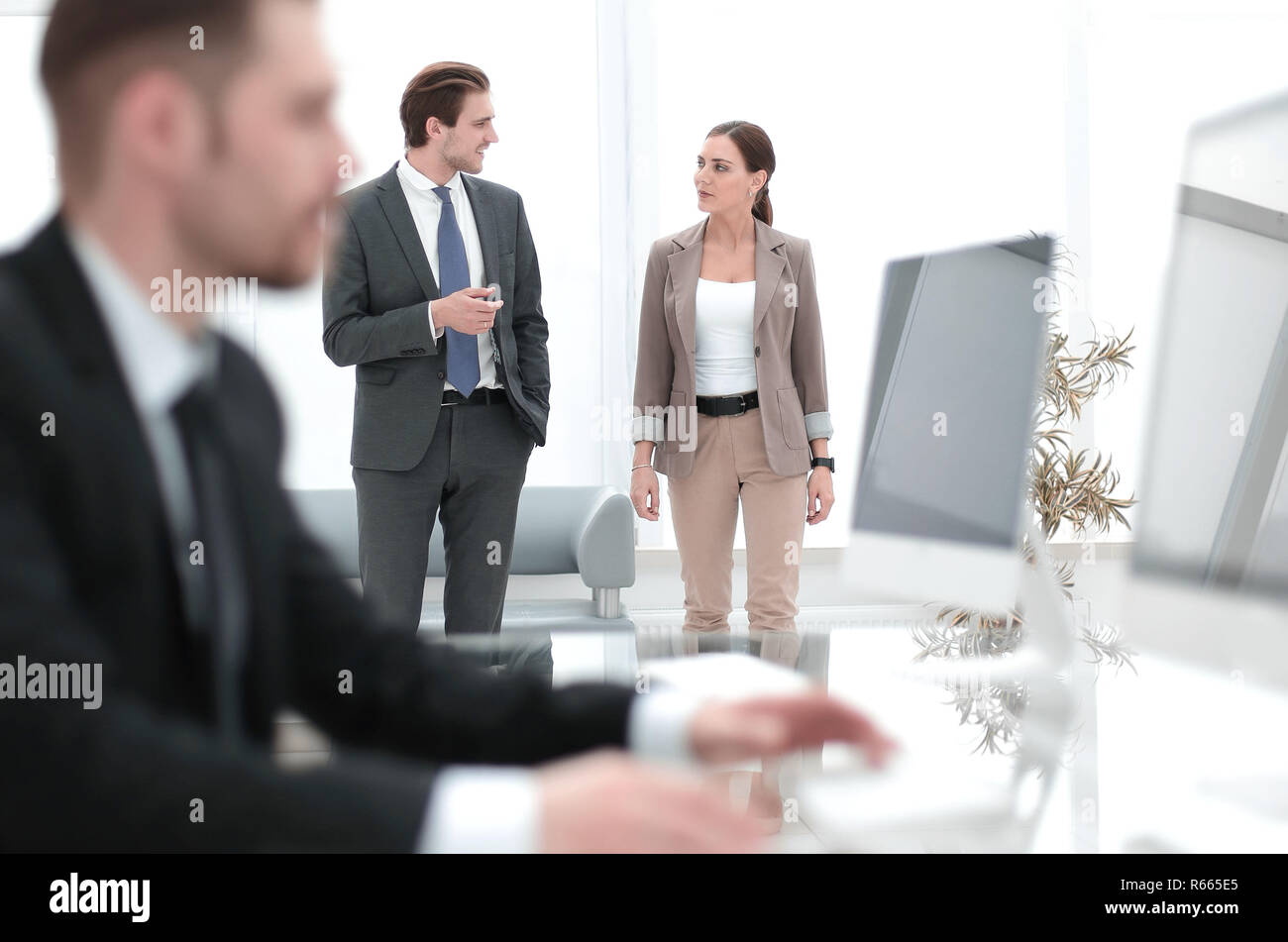 employees in a modern banking office Stock Photo - Alamy