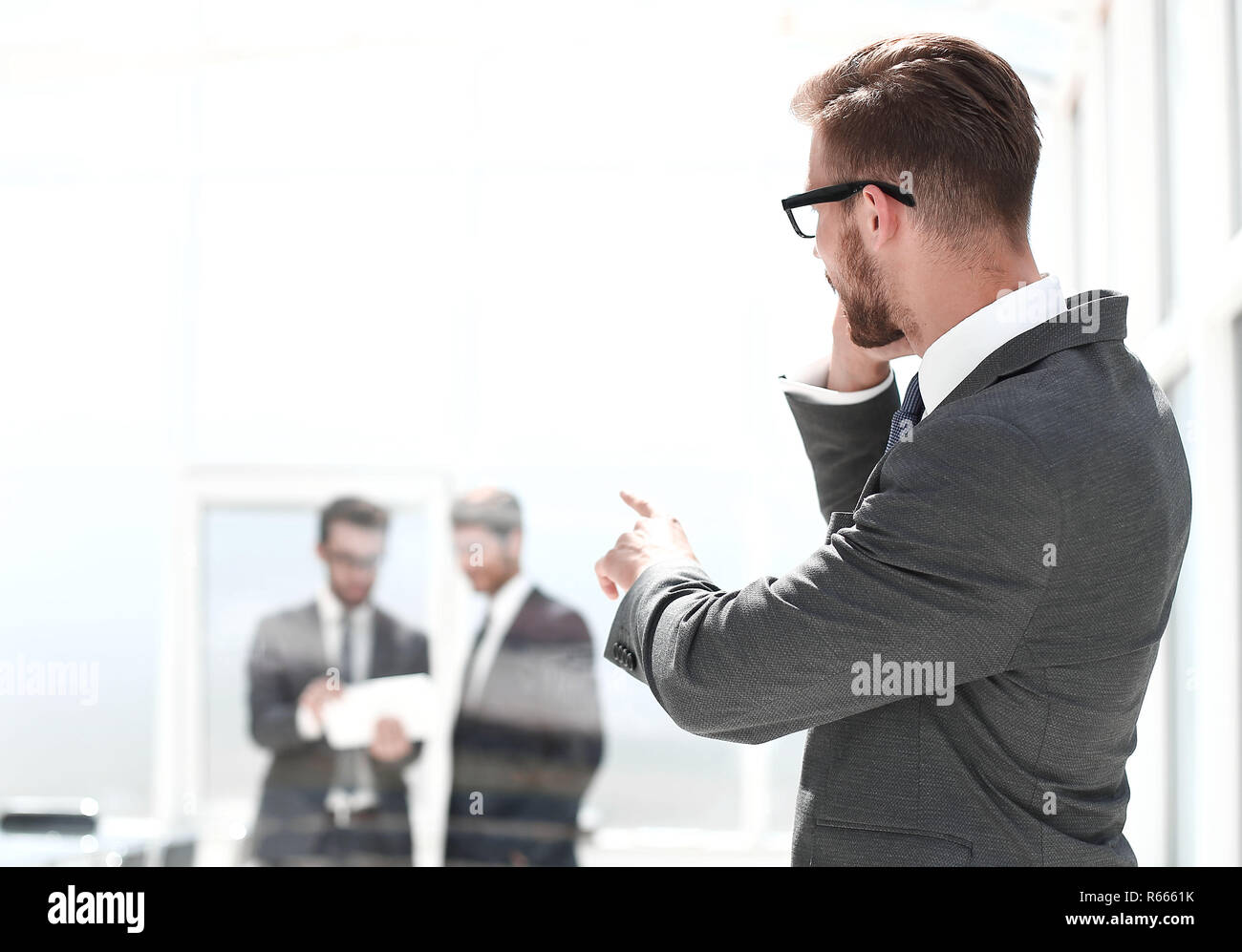 business man showing to the Bank office Stock Photo - Alamy