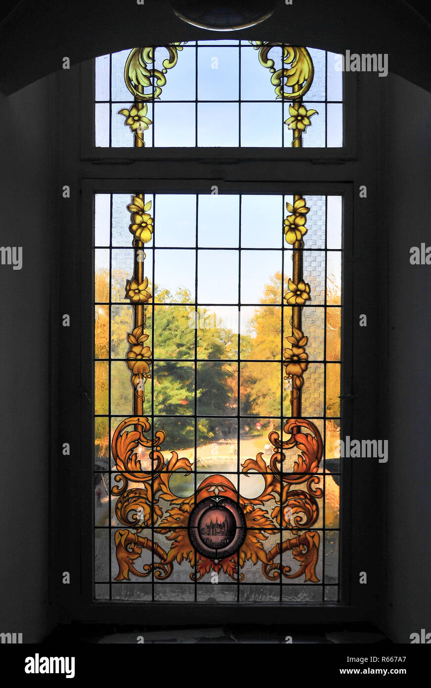 Moszna, Poland, October 2017. Stained glass window in Moszna Cstle ...