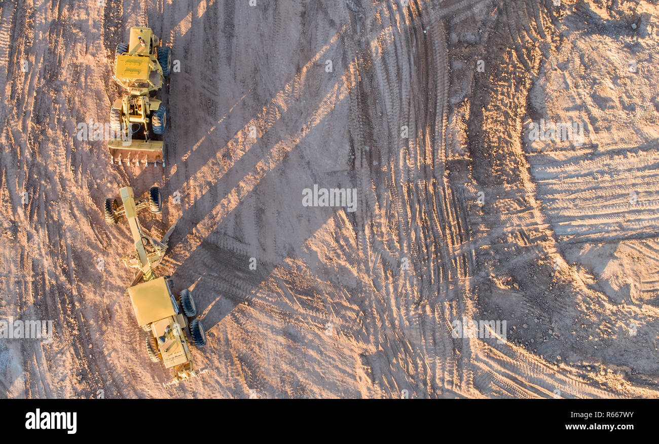 Aerial view of bulldozer & grader on a construction site Stock Photo ...