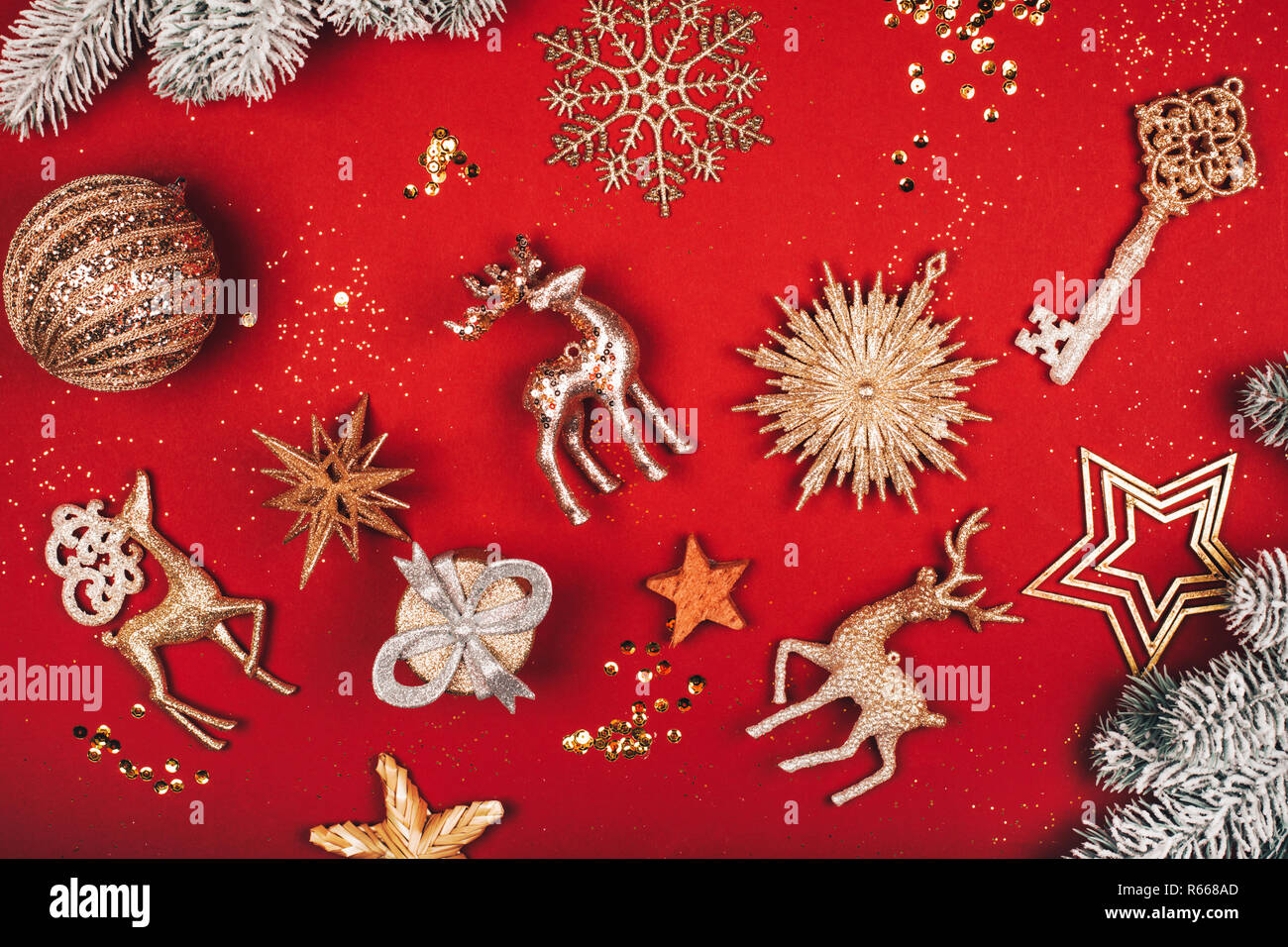 Christmas decorative toys: deers, stars, key, ball and glitter on red ...