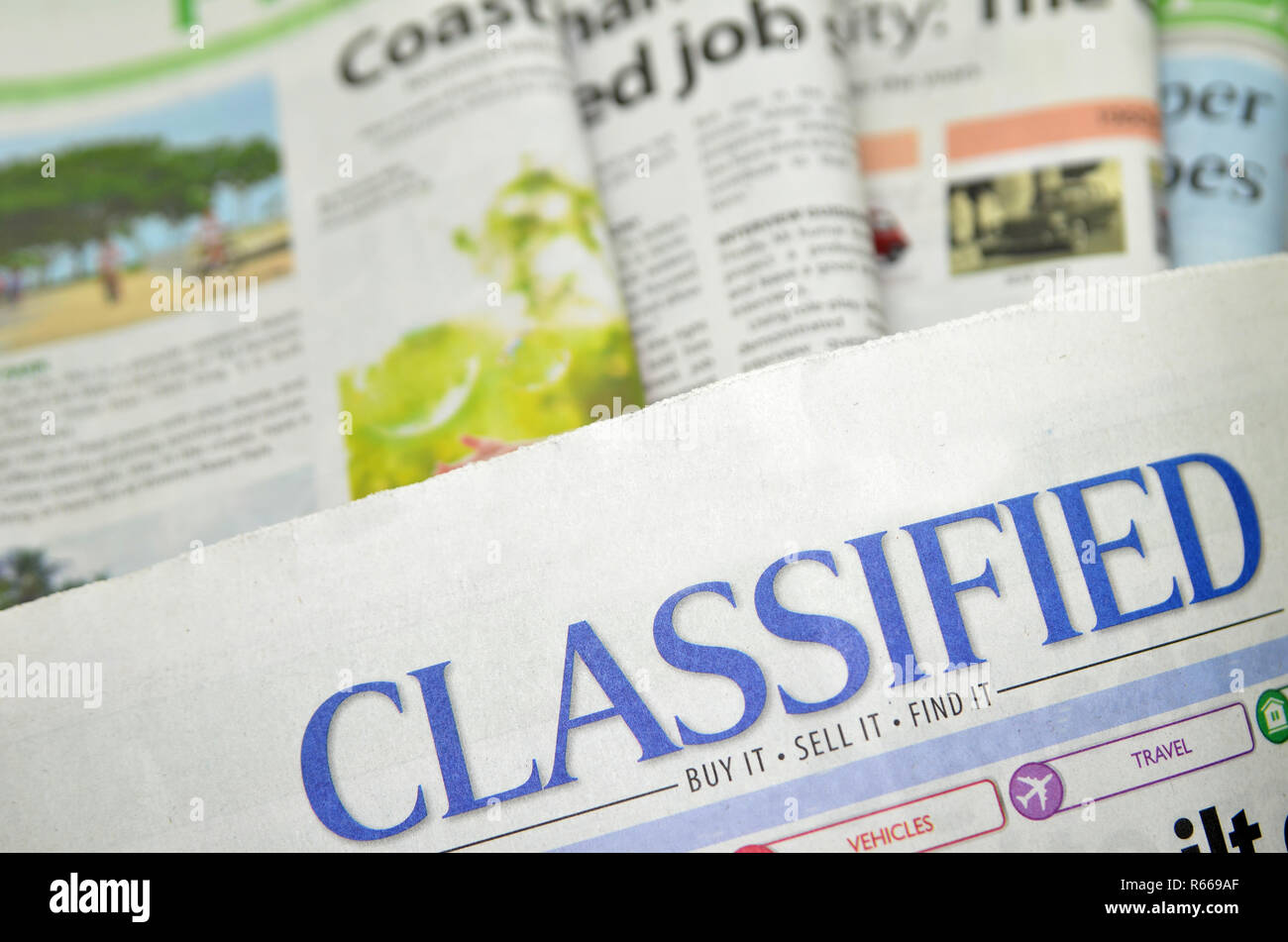Classified words on newspaper Stock Photo - Alamy