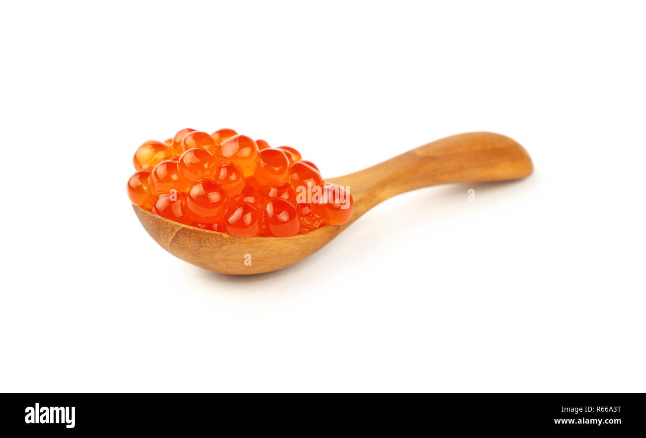 Wooden spoon of red salmon caviar close up Stock Photo - Alamy
