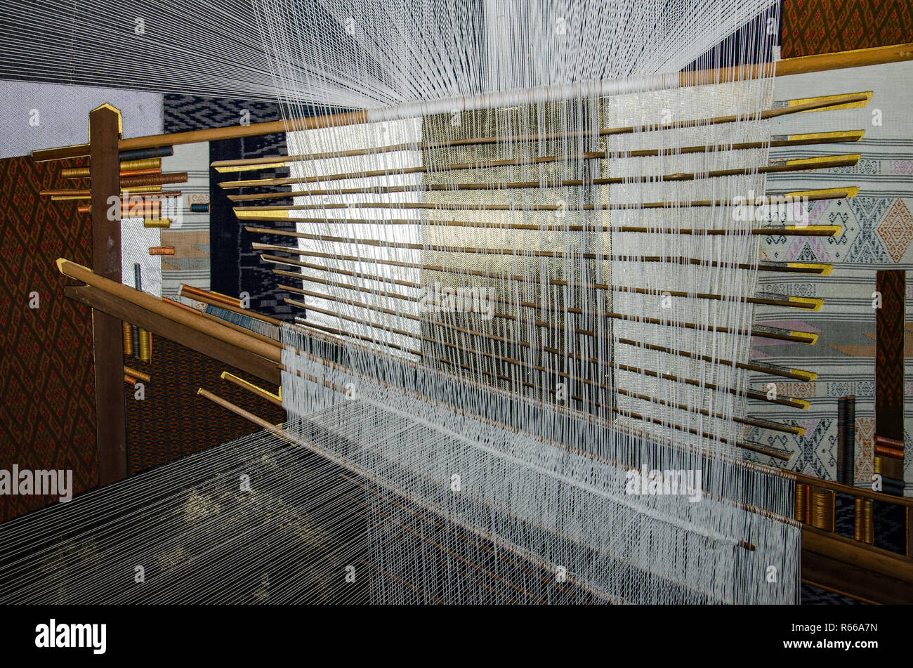 Thai traditional silk hand weaving process Stock Photo - Alamy