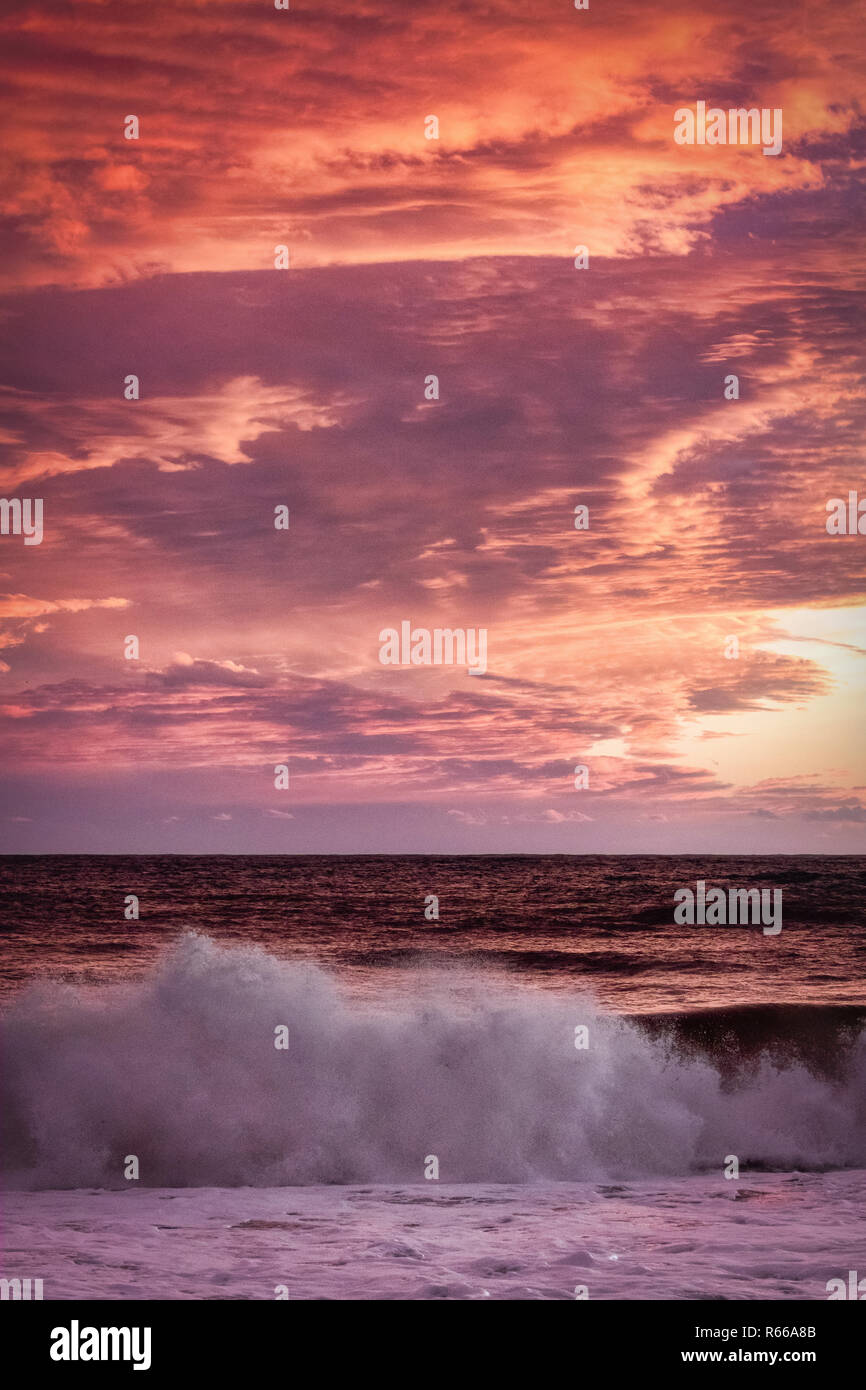 Beautiful sunset in Spain with big waves, Costa Brava Stock Photo - Alamy