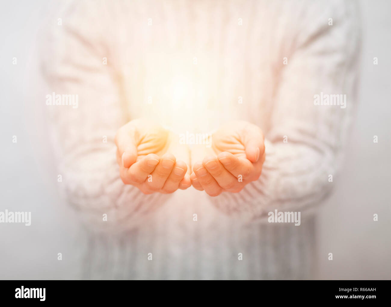 Light in hands Stock Photo - Alamy