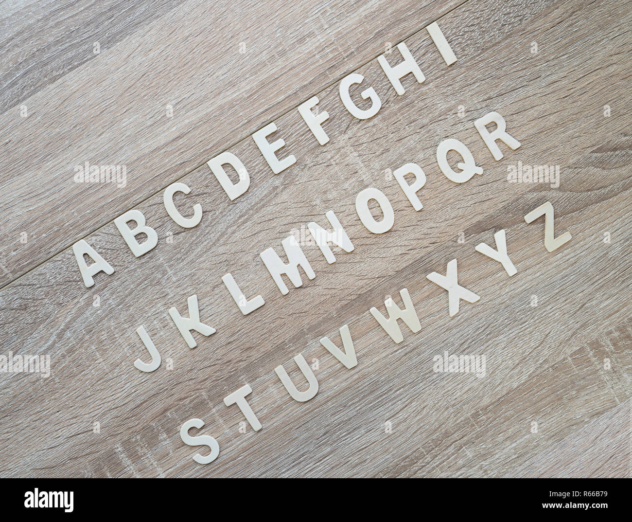 ABC on the wooden background Stock Photo - Alamy