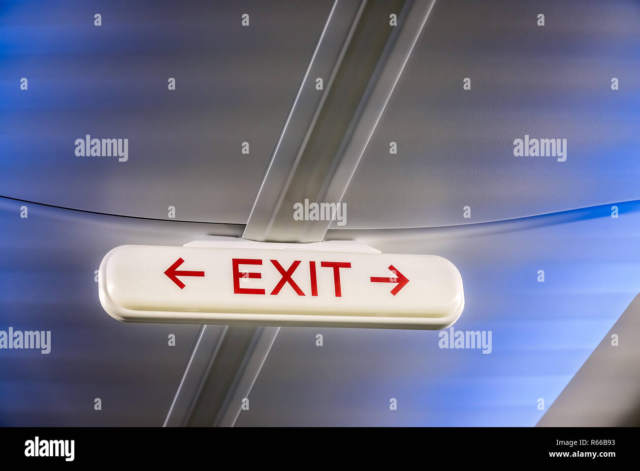 Emergency Exit Sign inside a plane Stock Photo - Alamy