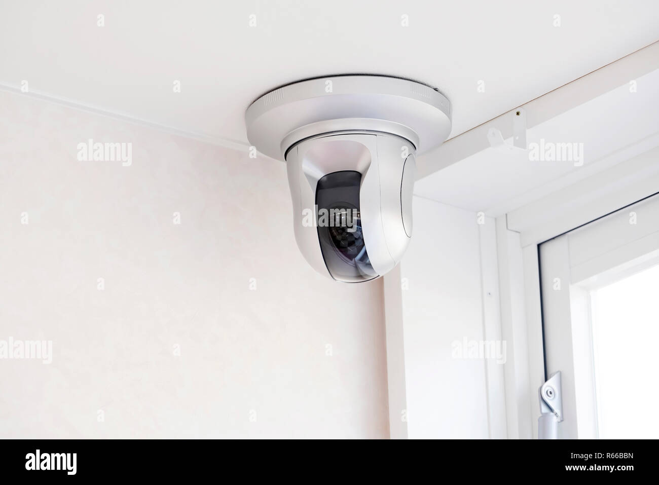 Security camera on white ceiling with crime system. house CCTV camera ...