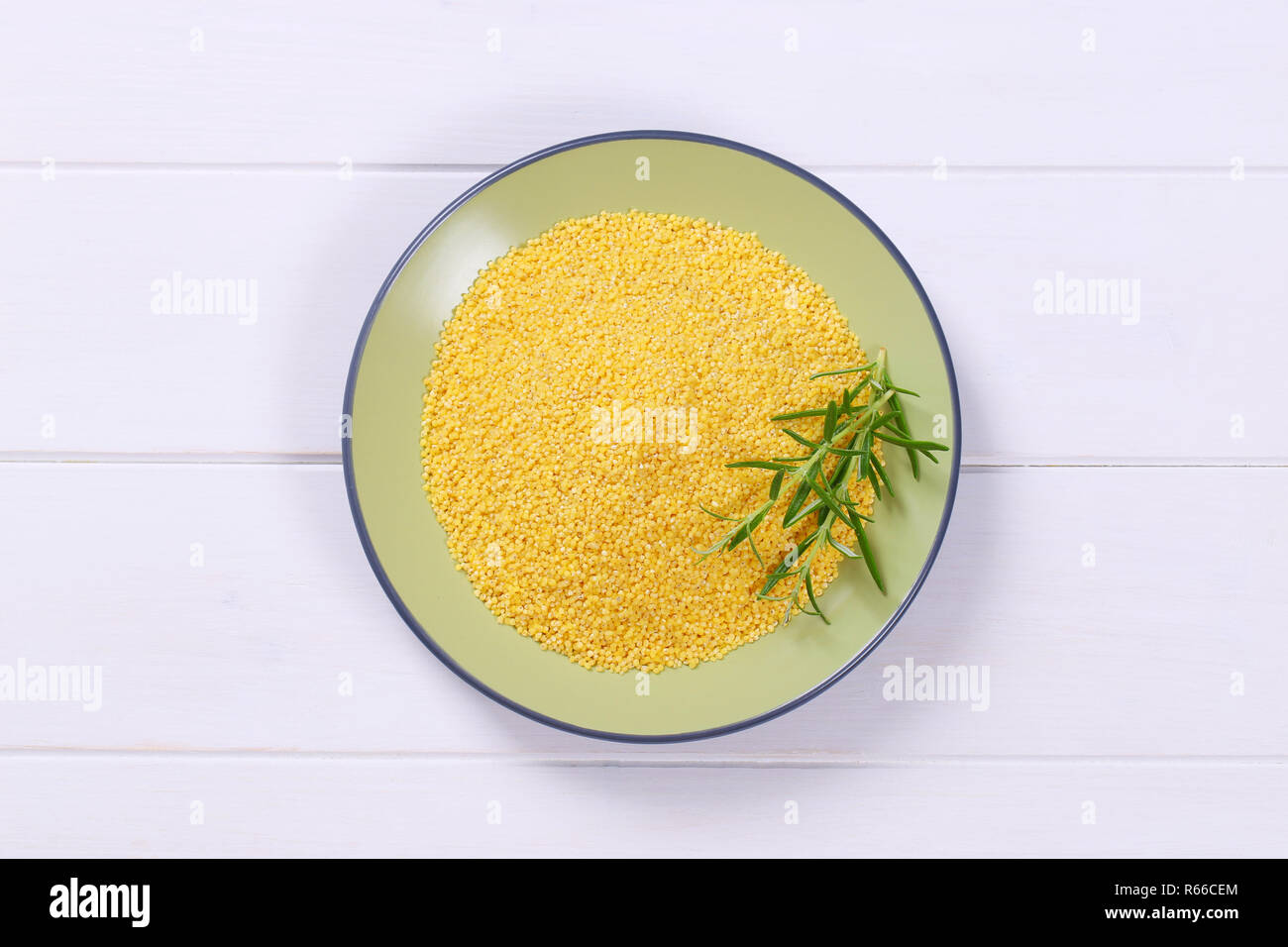 plate of raw millet grains Stock Photo - Alamy