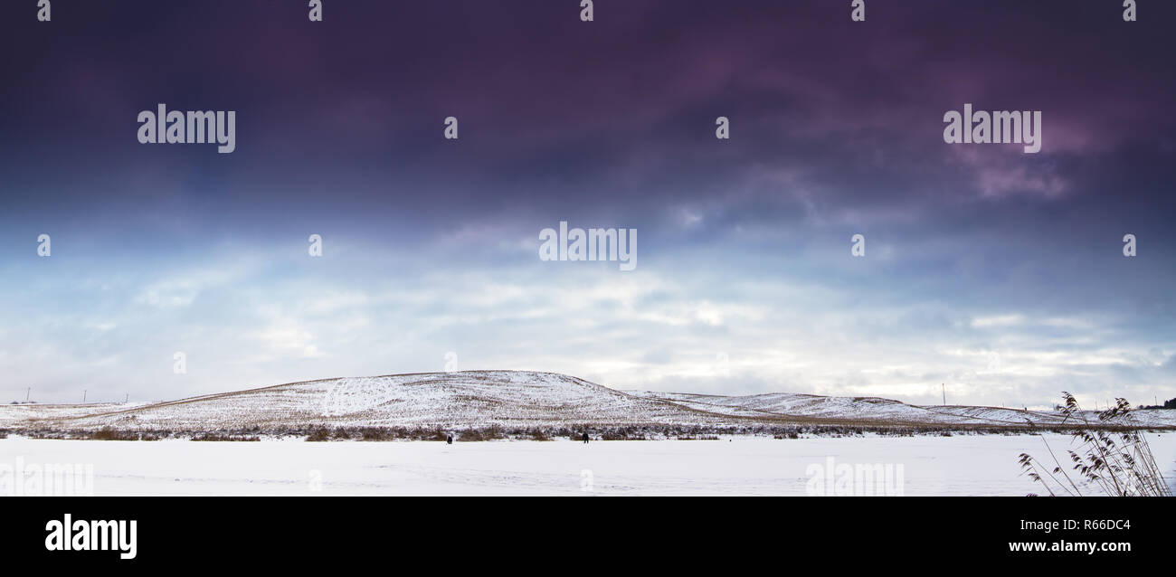 Winter landscape, frozen lake in snow. Snow covered fields Stock Photo ...