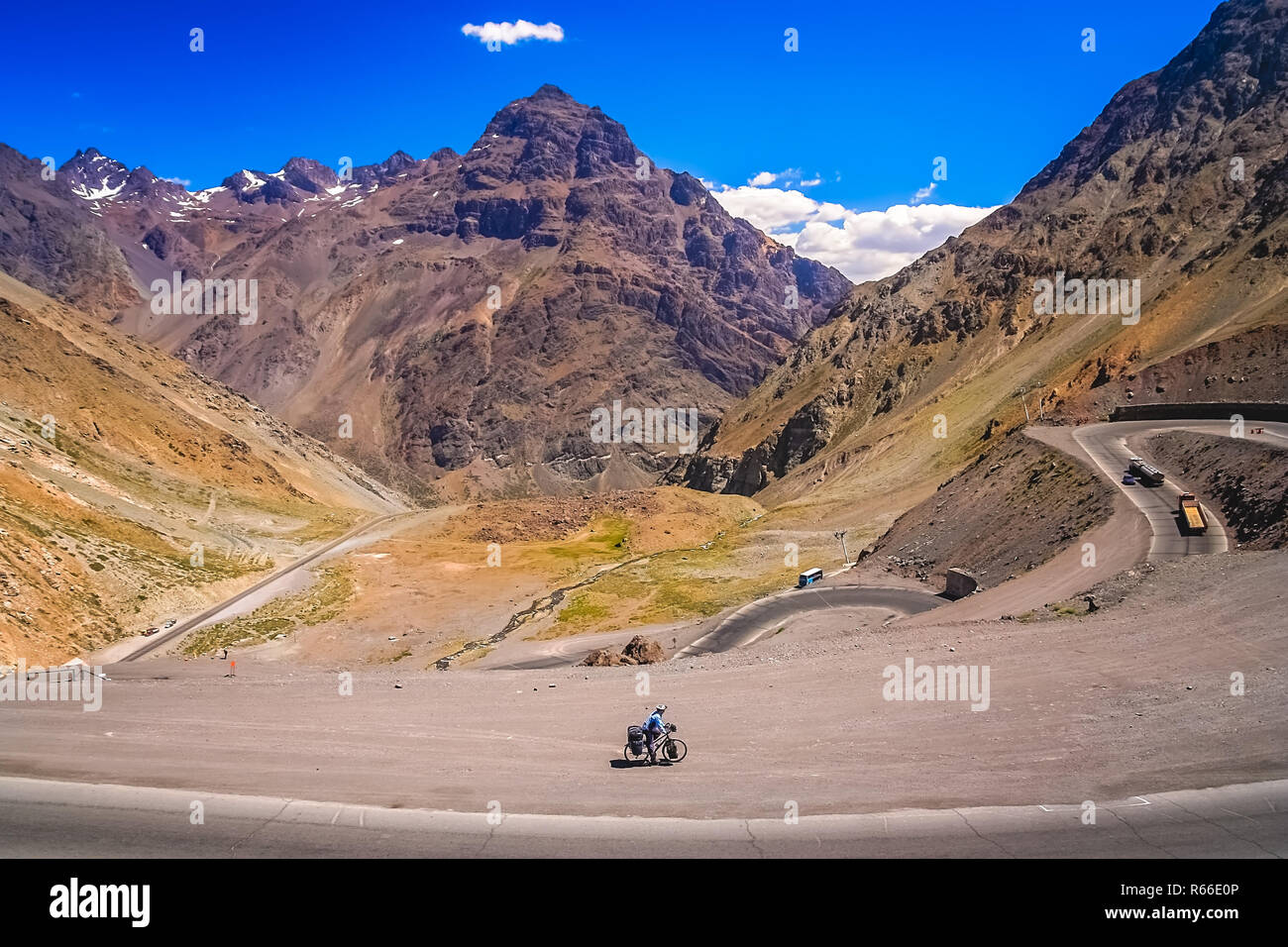 Cycling down the switchback road Stock Photo - Alamy