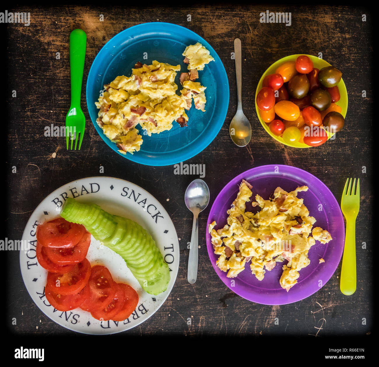 Kids scrambled eggs breakfast Stock Photo - Alamy