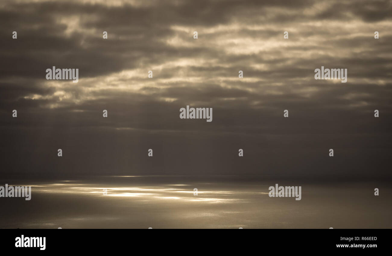 Light rays on the ocean surface Stock Photo - Alamy