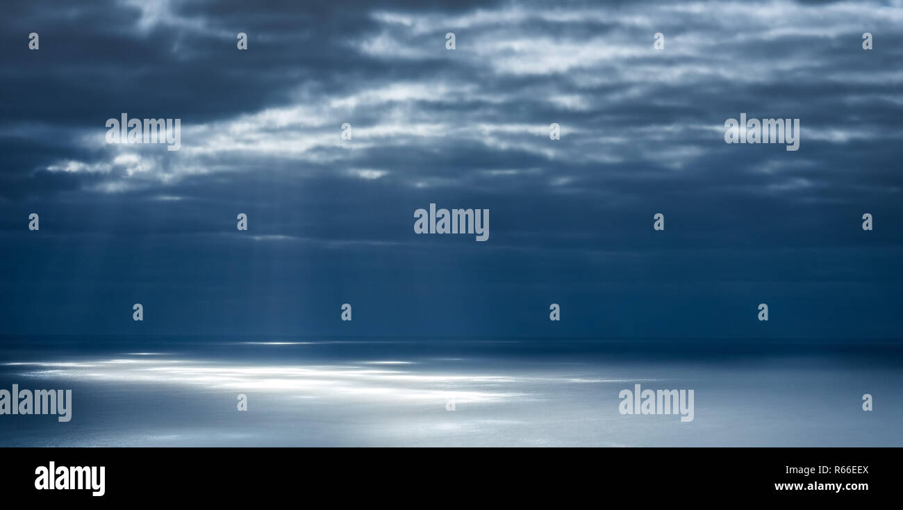 Light rays on the ocean surface Stock Photo - Alamy