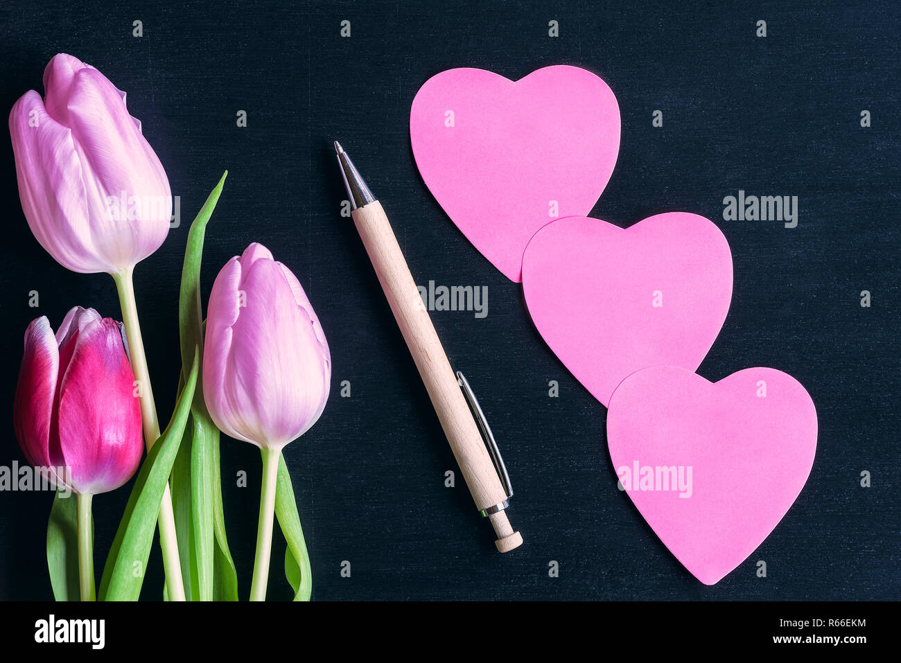 Flowers and heart shaped paper notes Stock Photo - Alamy