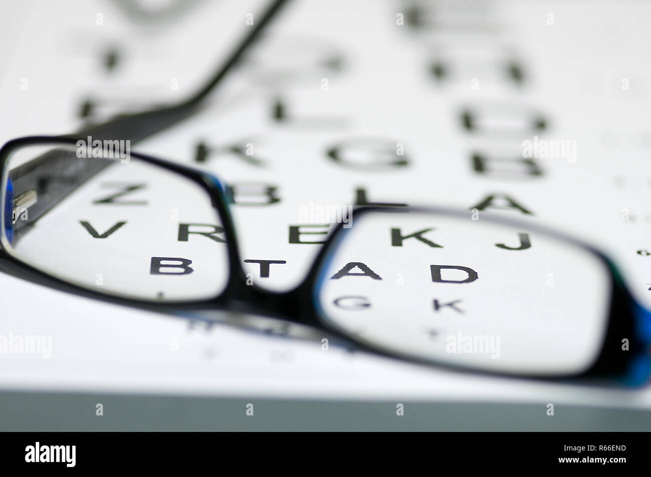 a pair of glasses on a Distance Vision Test sheet Stock Photo - Alamy