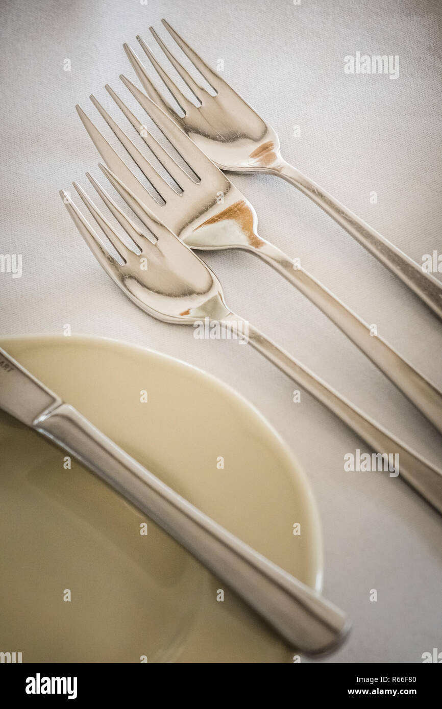 Forks on a table Stock Photo - Alamy