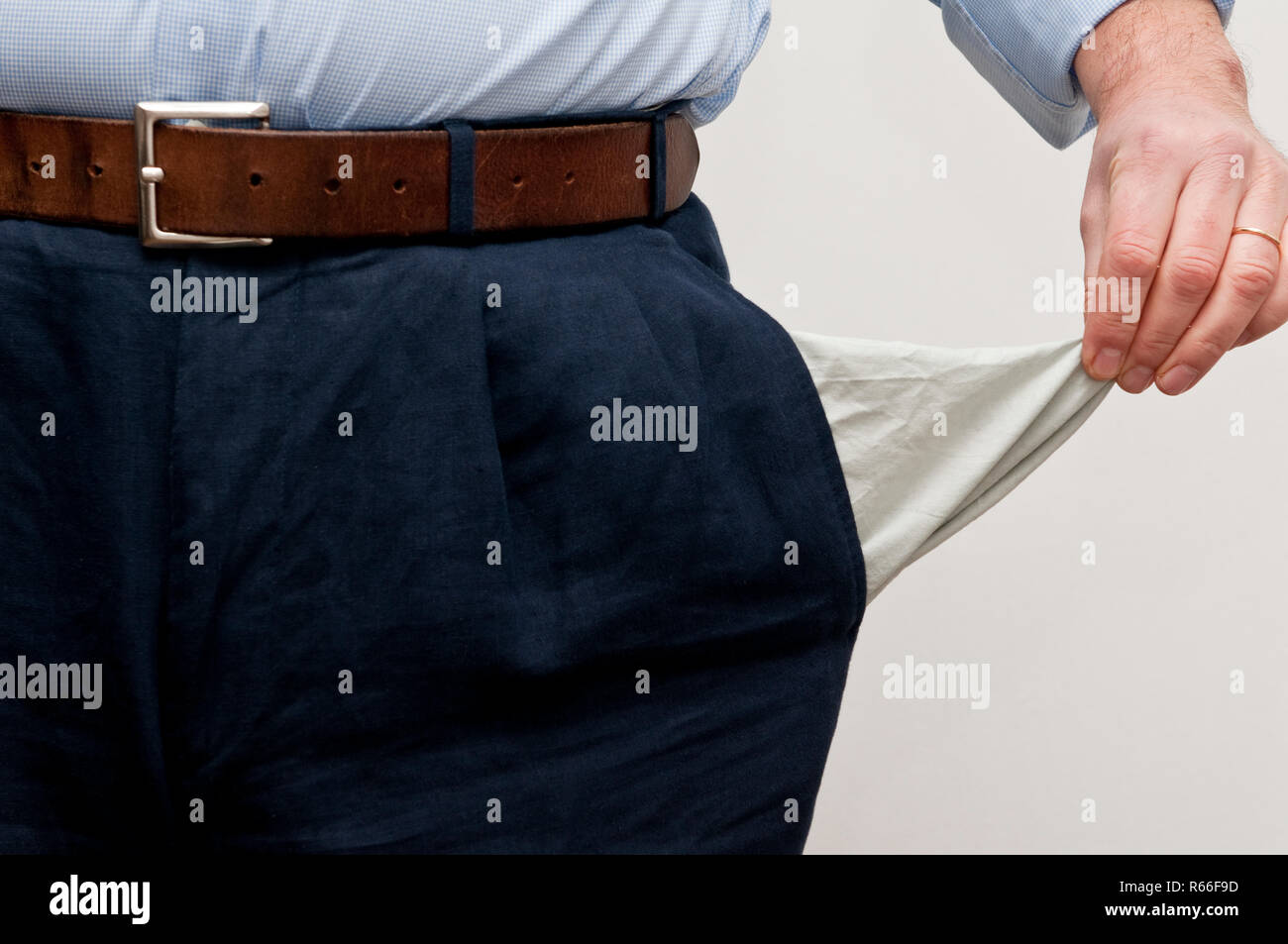 man with empty pocket Stock Photo - Alamy