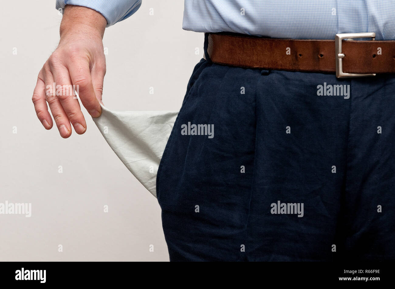 man with empty pocket Stock Photo - Alamy