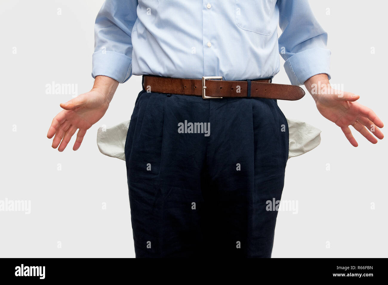 man with empty pockets Stock Photo - Alamy