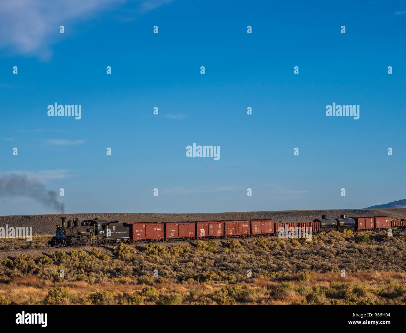 Locomotive 453 steam-engine freight train approaches Hangman's Trestle ...