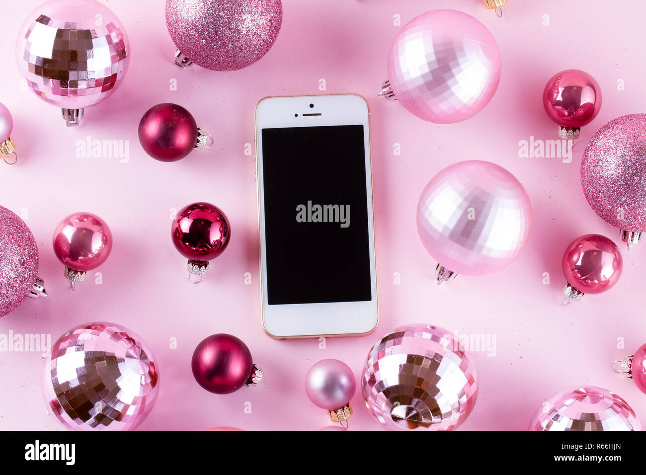 Christmas mock up with white on pink background Stock Photo - Alamy