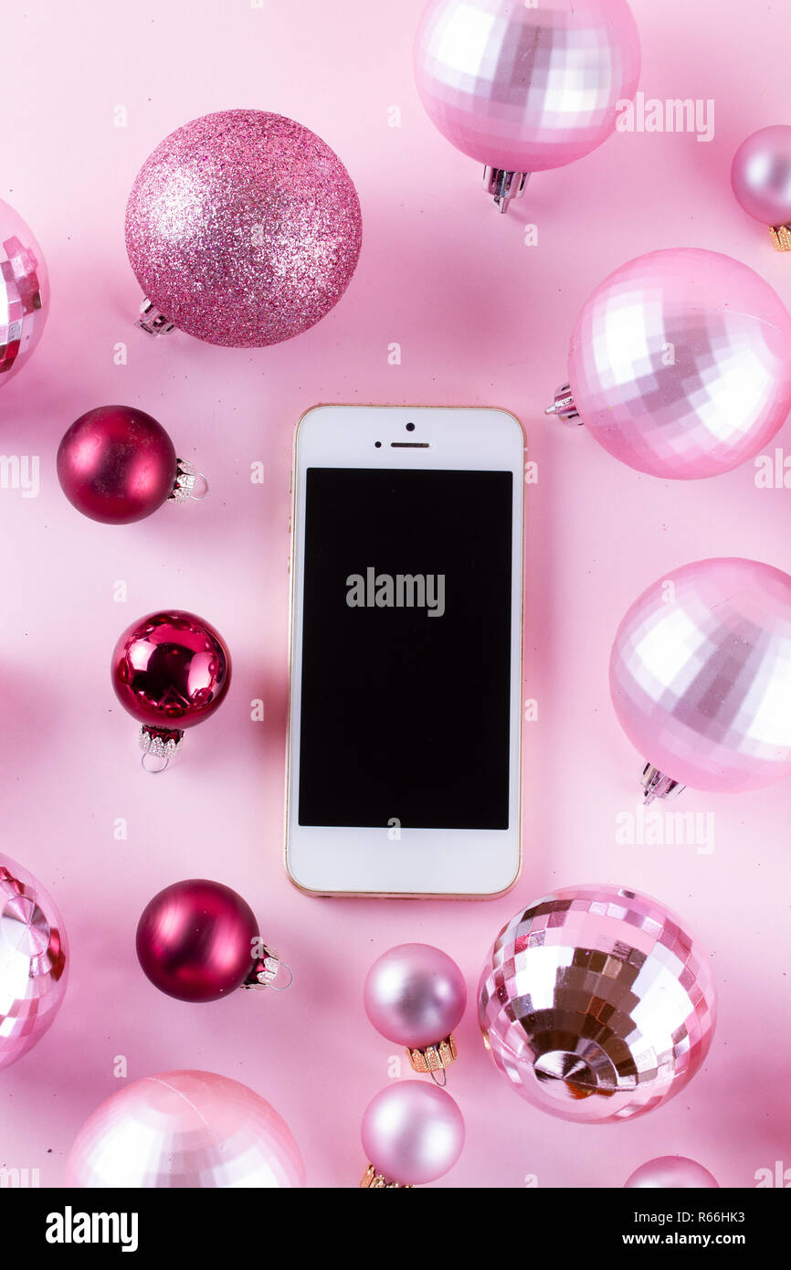 Christmas mock up with white on pink background, top view Stock Photo ...