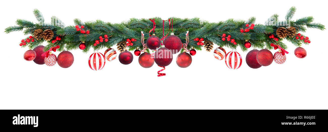 Christmas garland with red balls, cones and berries on isolated white ...