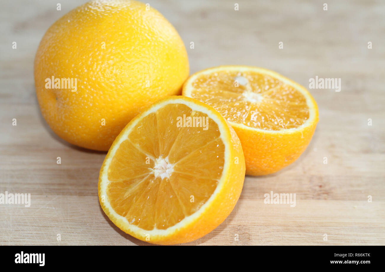 Orange sliced in half Stock Photo - Alamy