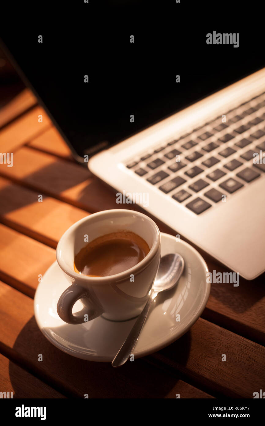 Coffee and laptop Stock Photo - Alamy