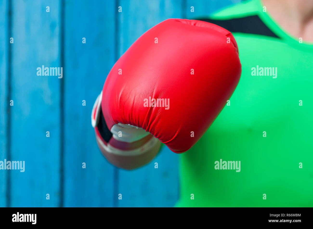 human hand in a red boxing glove Stock Photo - Alamy
