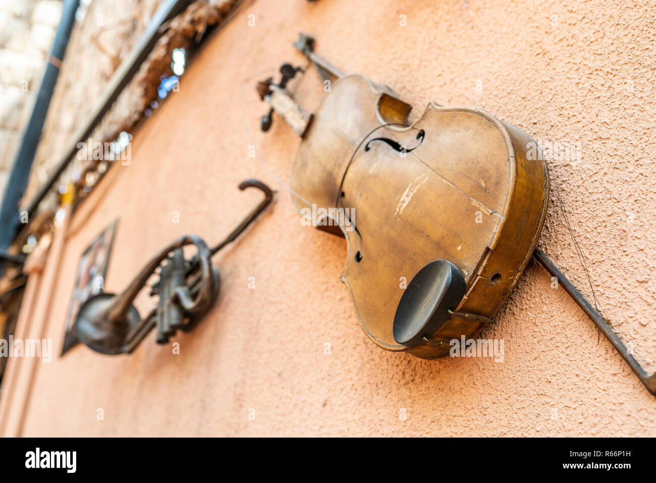 Retro style musical instruments hanging from a wall, a musical vintage ...