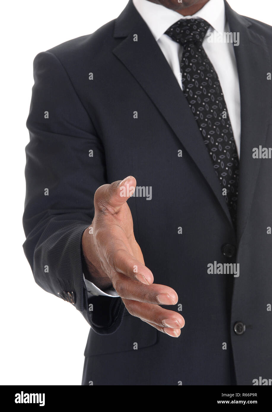 Outstretched hand from a business man Stock Photo - Alamy