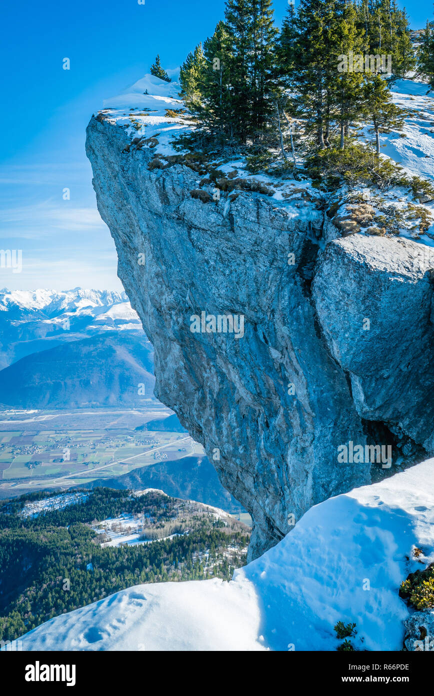 Cliff with snow Stock Photo - Alamy