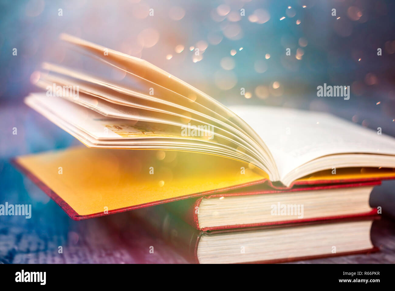Vintage open book Stock Photo - Alamy