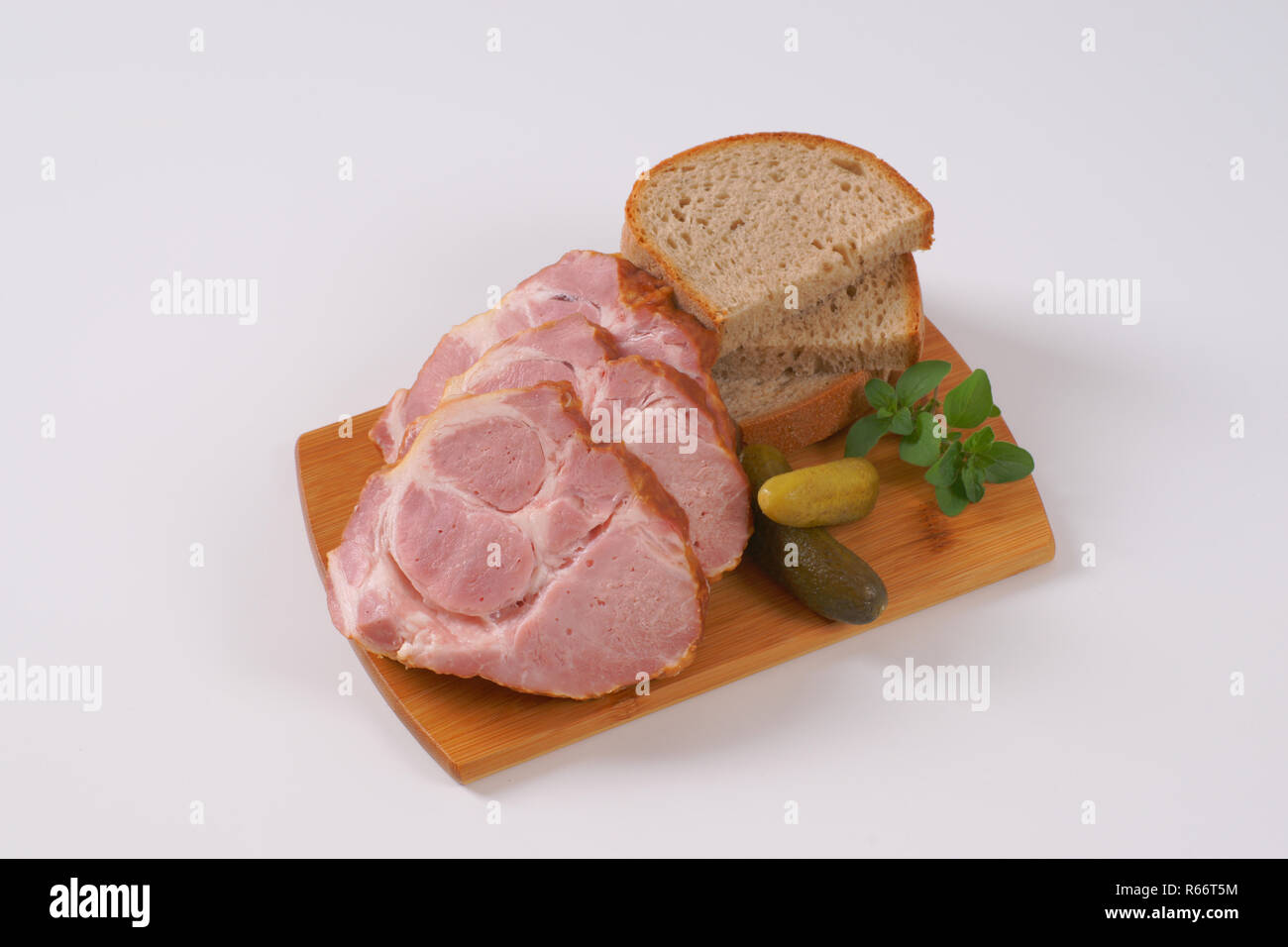 smoked pork neck with bread Stock Photo - Alamy