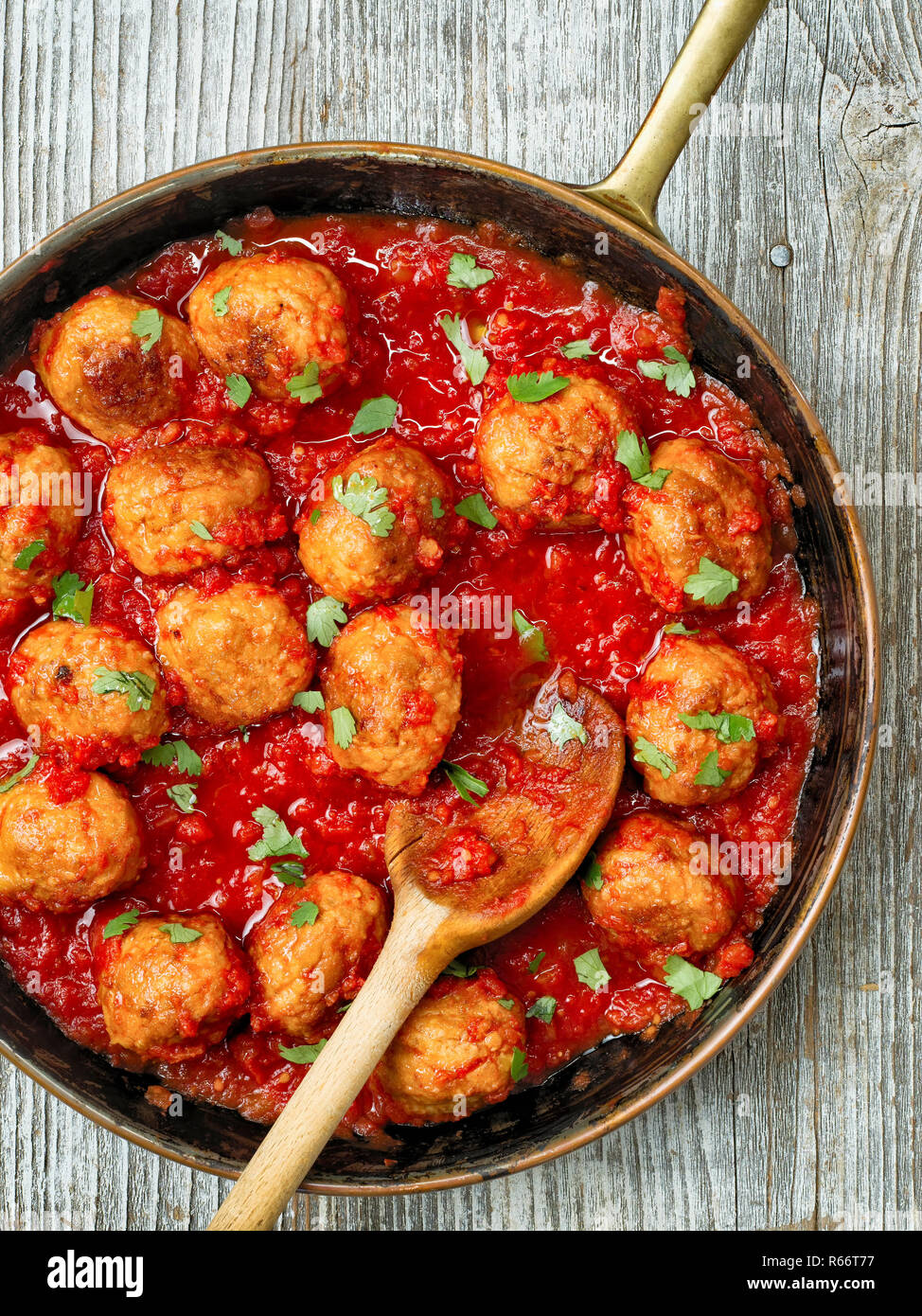 rustic italian meatball in tomato sauce Stock Photo - Alamy