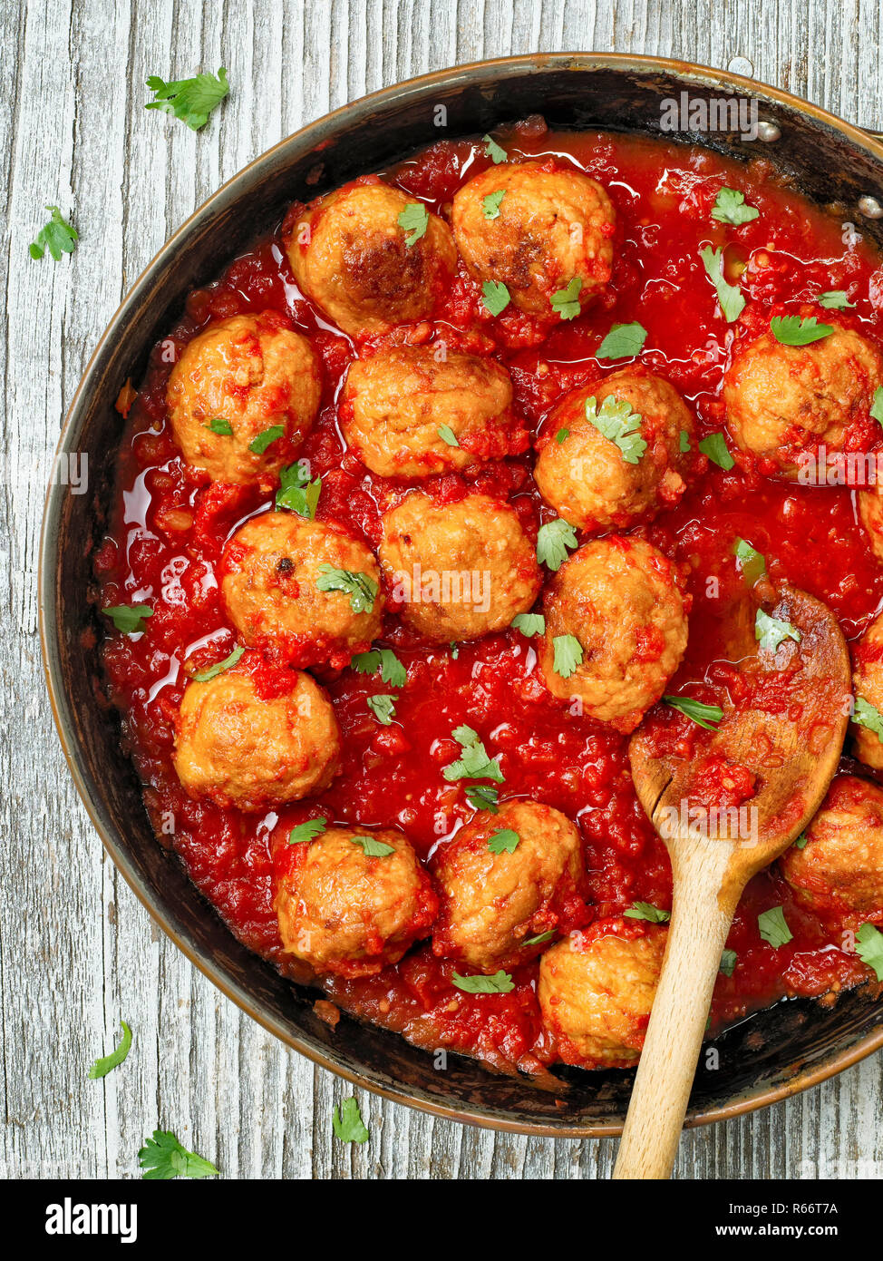 rustic italian meatball in tomato sauce Stock Photo - Alamy
