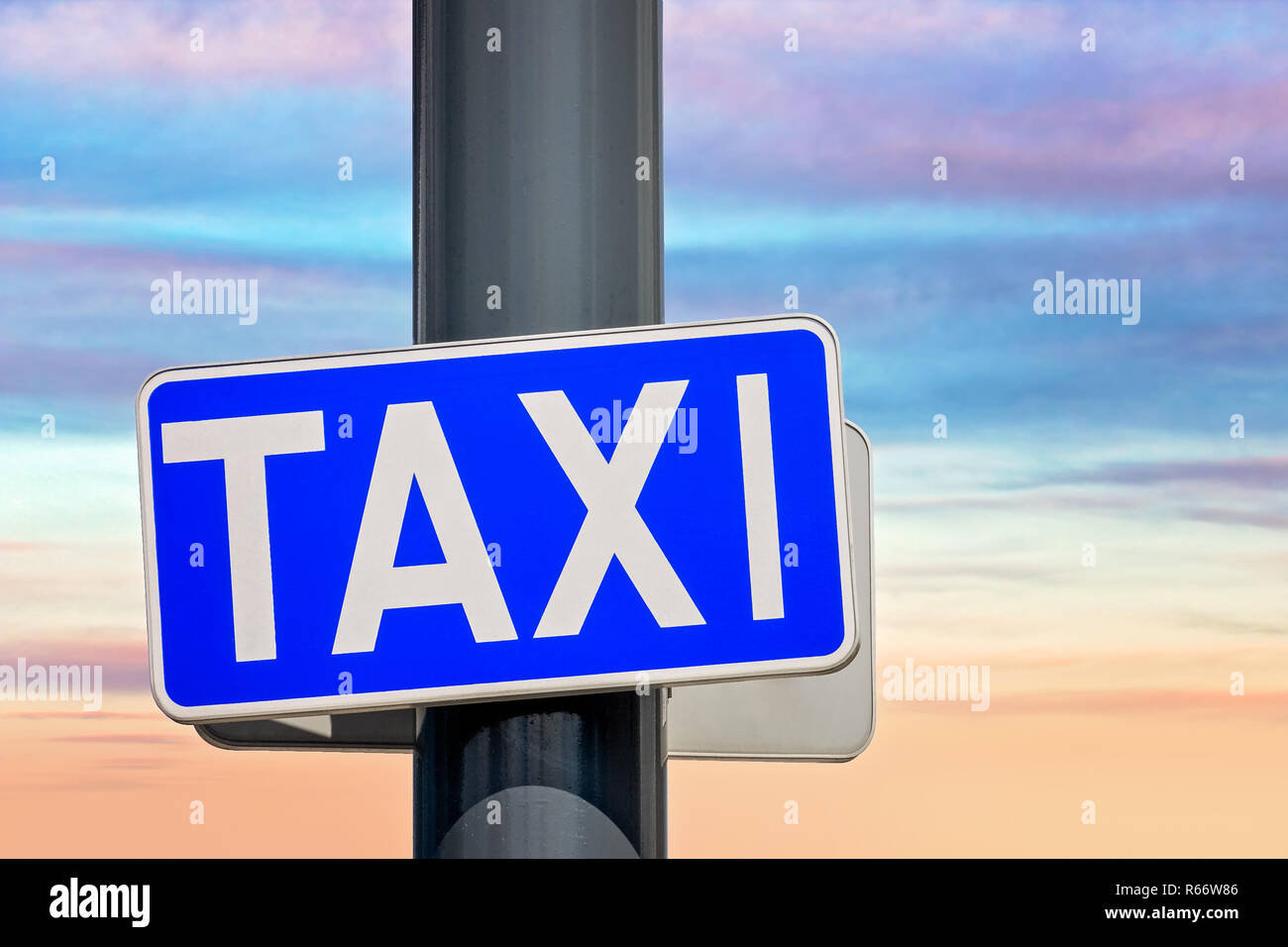 Blue taxi rank sign Stock Photo - Alamy