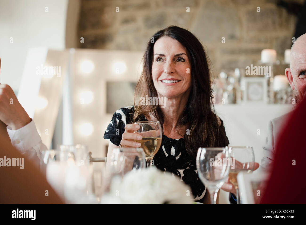 Raising A Glass To A Wedding Toast Stock Photo - Alamy