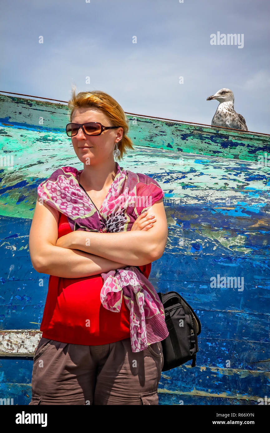 Portrait of a woman with a seagull Stock Photo - Alamy
