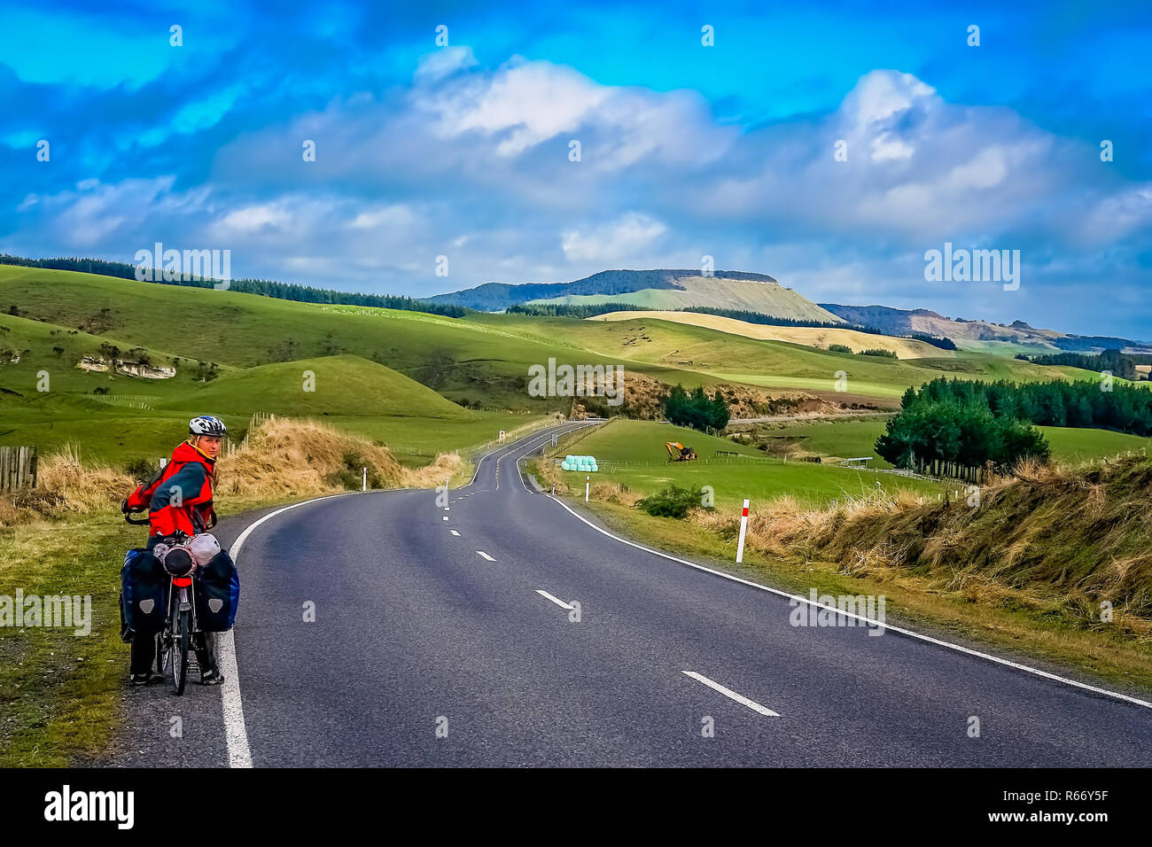 Woman and road cycle new zealand hi-res stock photography and images ...