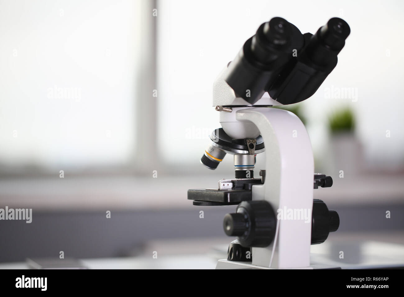 The head microscope on the background laboratory Stock Photo - Alamy