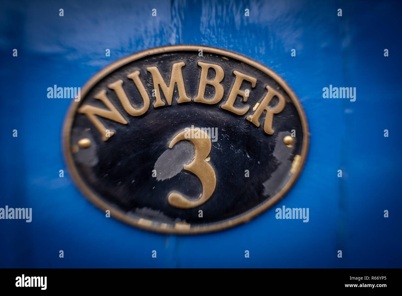 Number 3 plaque Stock Photo - Alamy