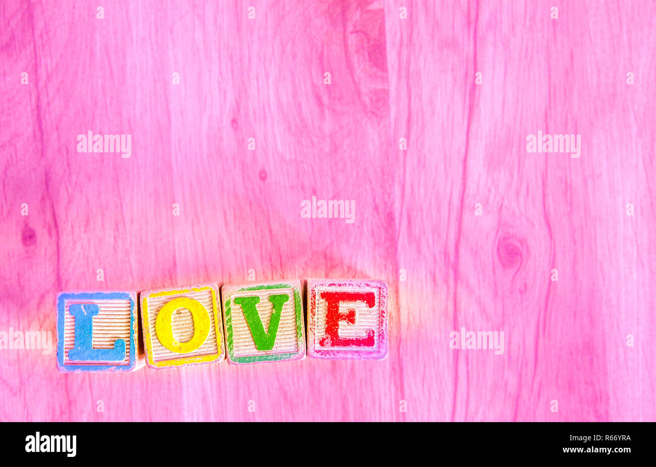 Wooden Toy Blocks Spell Love Stock Photo - Alamy