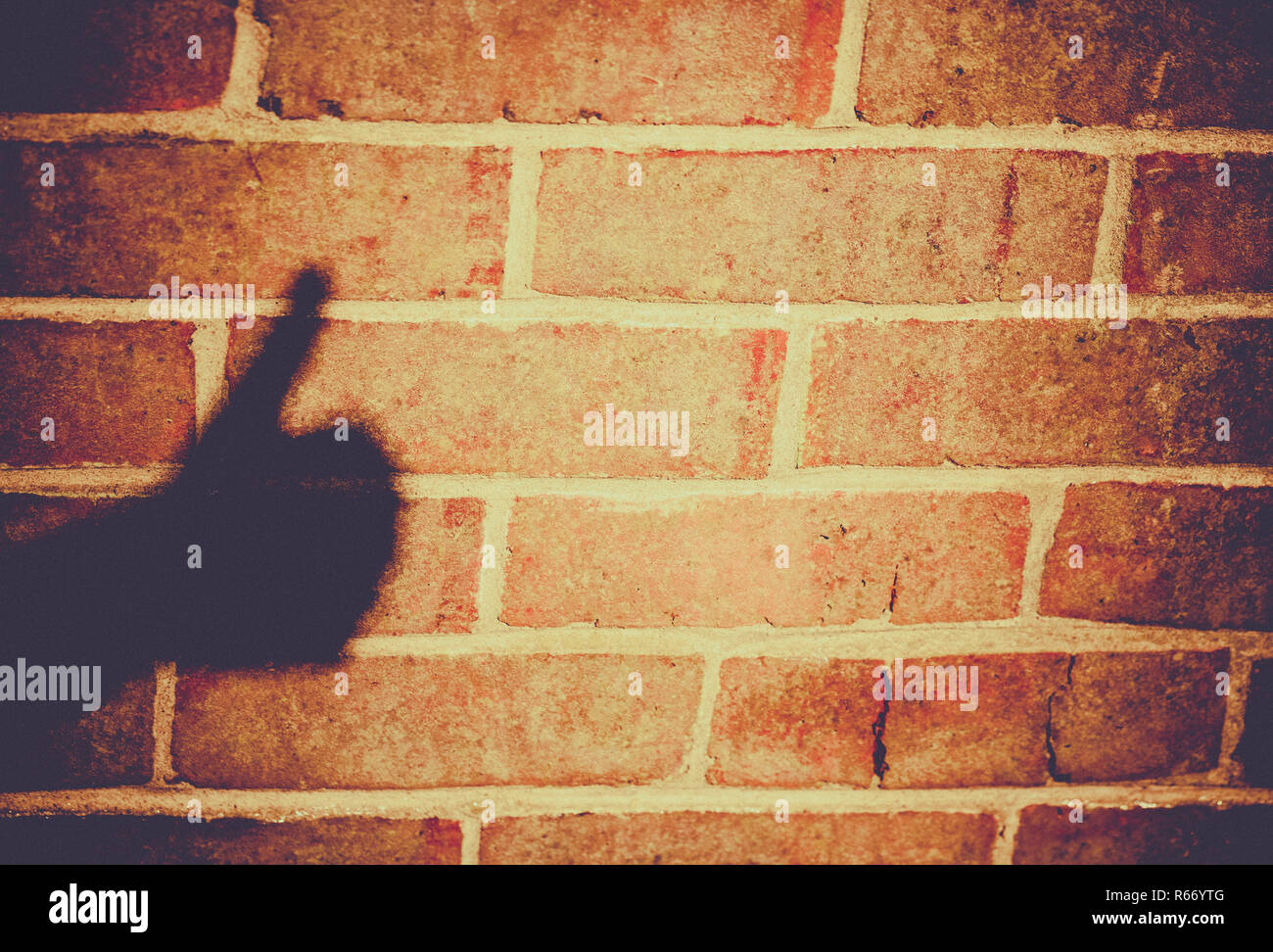 Thumbs up shadow Stock Photo - Alamy