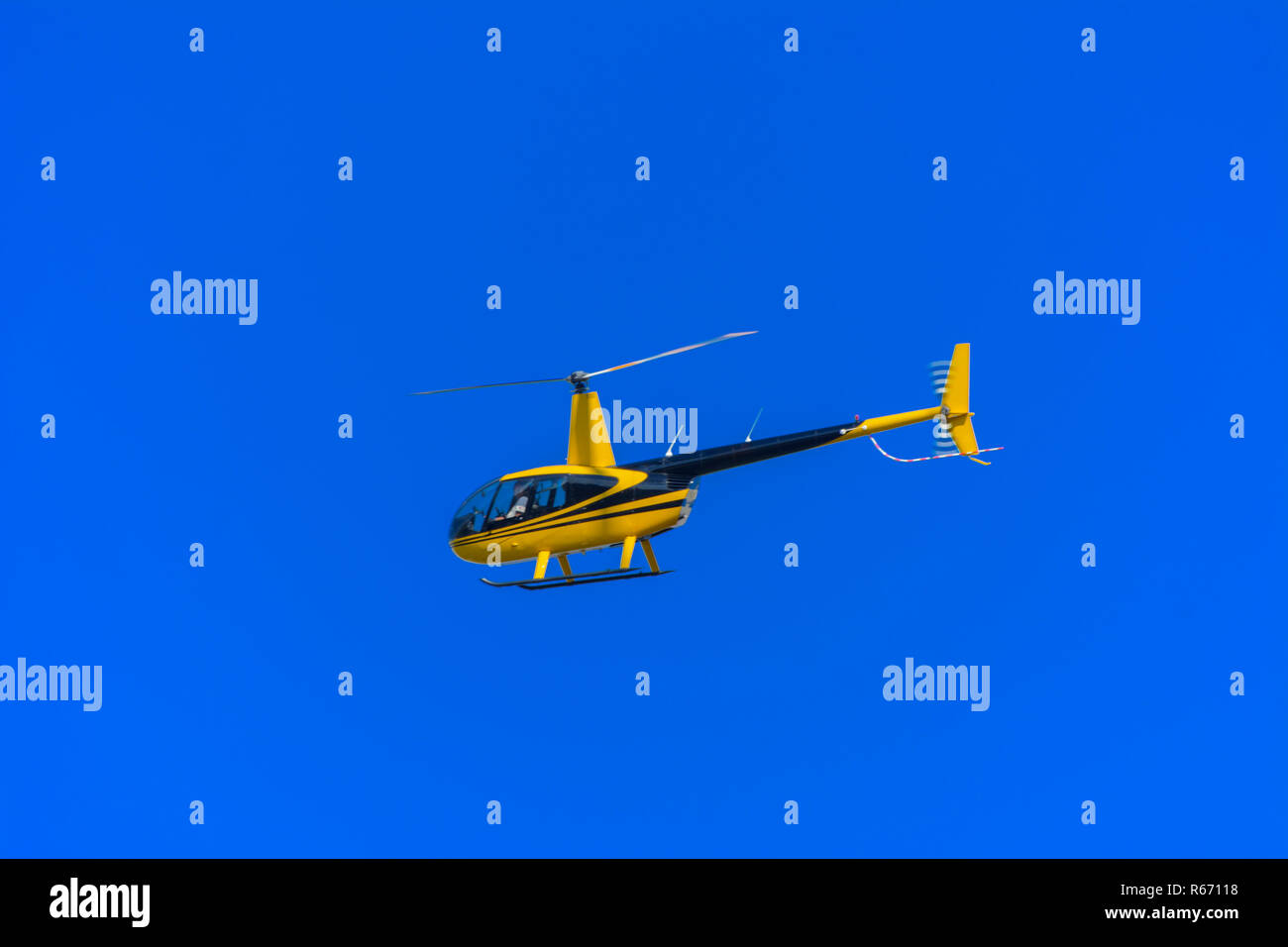 Bright yellow helicopters hi-res stock photography and images - Alamy