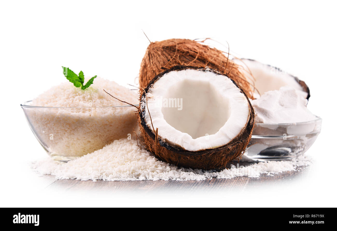 Composition with shredded coconut and shells isolated on white Stock ...